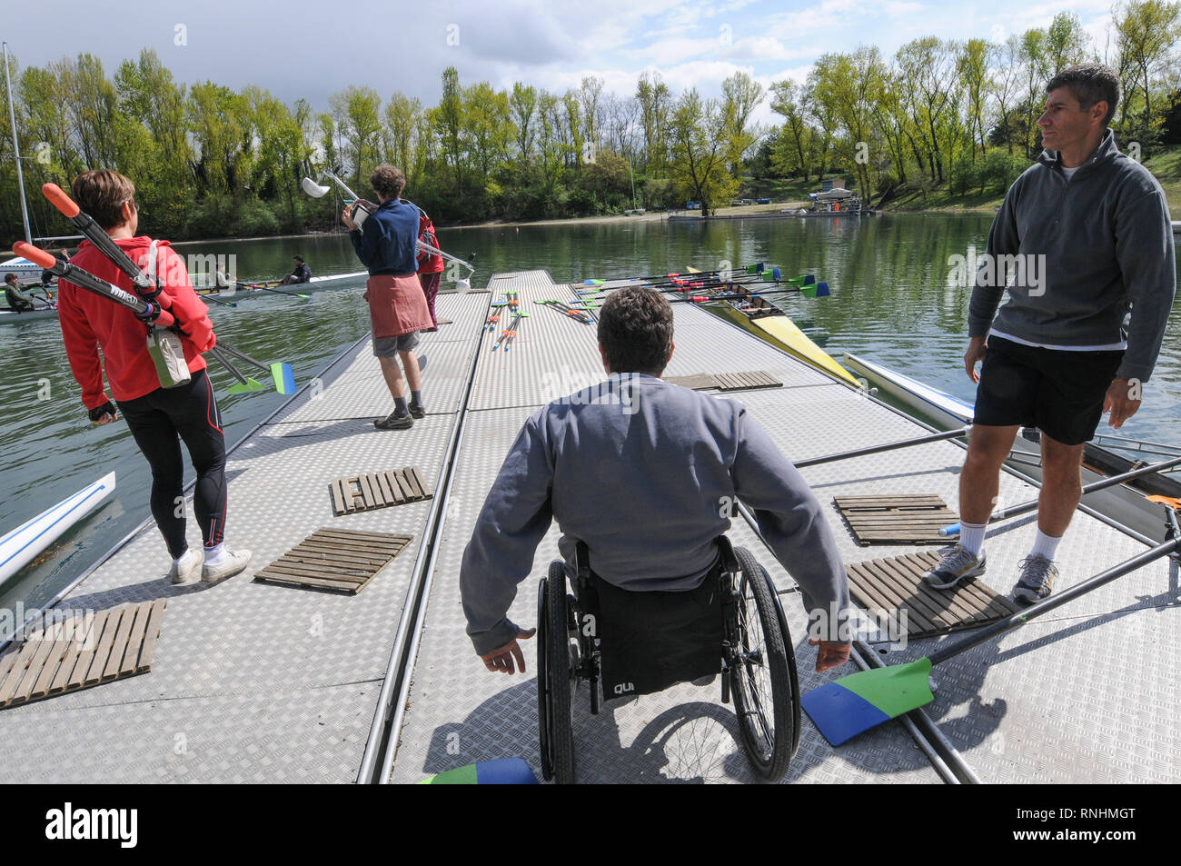 Paraplegic man enjoys rowing at Miribel-Jonage Park, France Stock Photo ...