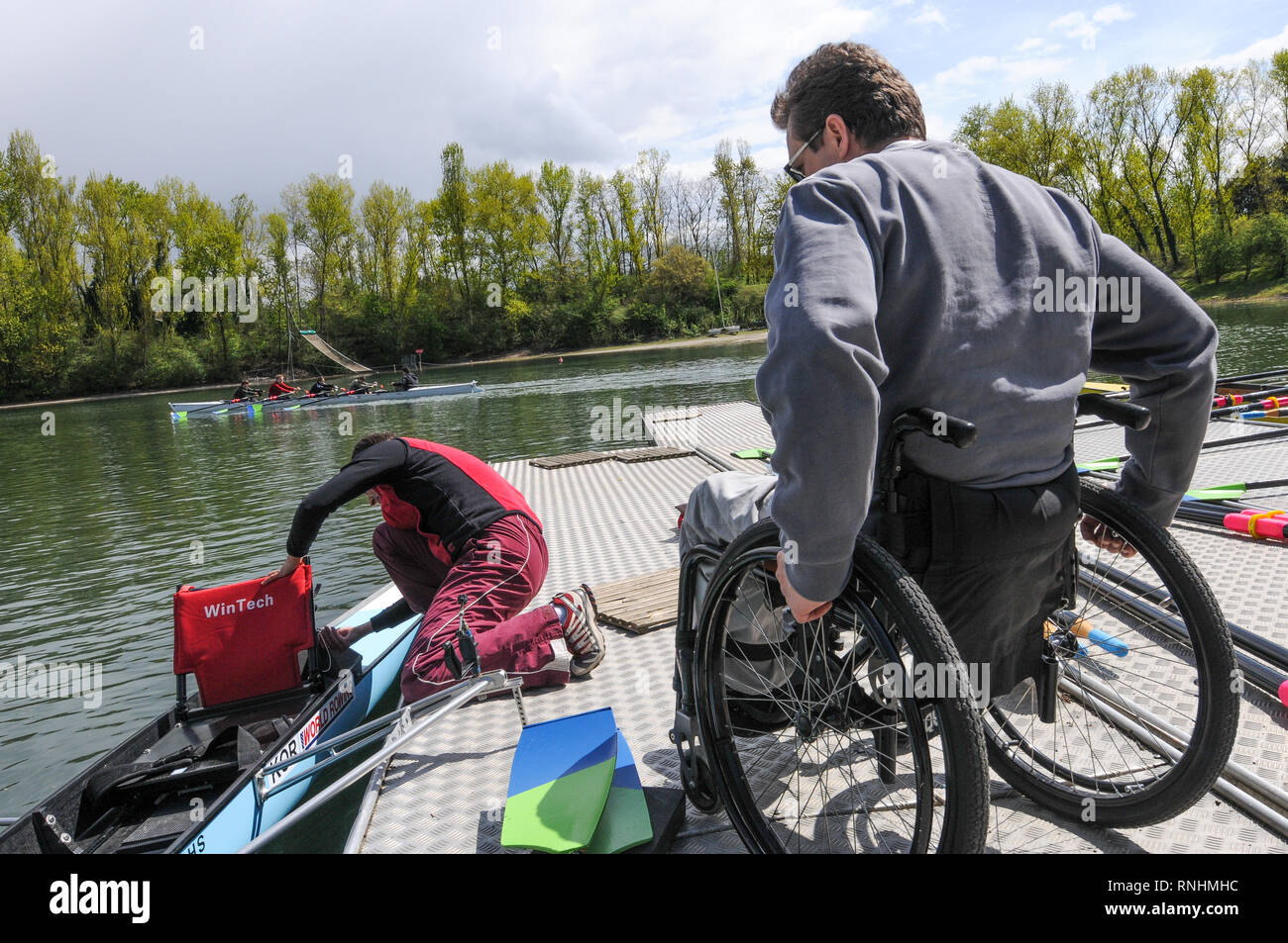 Paraplegic man enjoys rowing at Miribel-Jonage Park, France Stock Photo ...