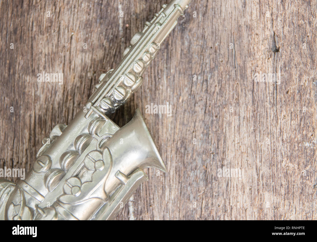saxophone for decorate old close up on vintage wooden background with ...