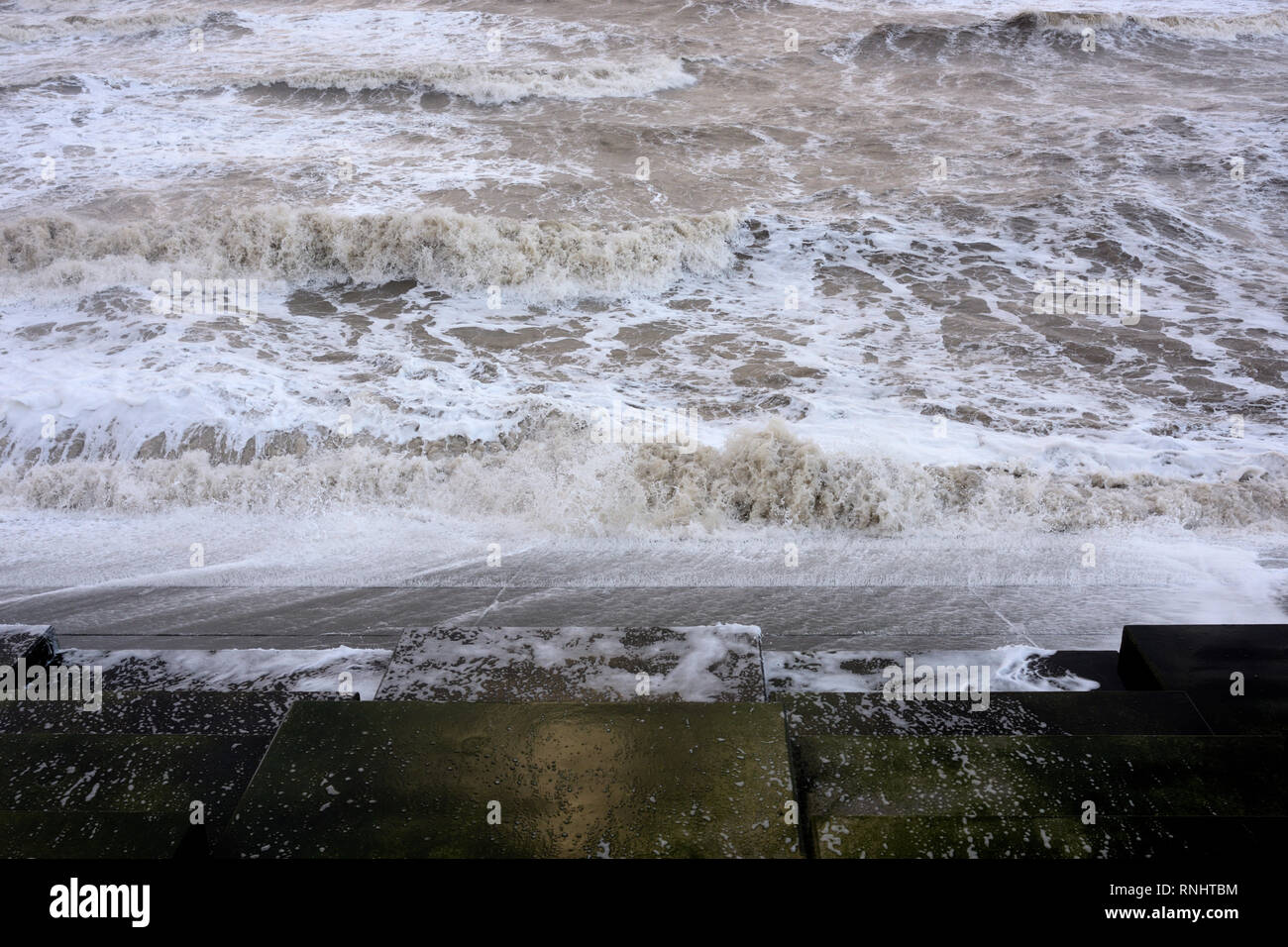 Waves Breaking Against Sea Wall High Resolution Stock Photography and ...