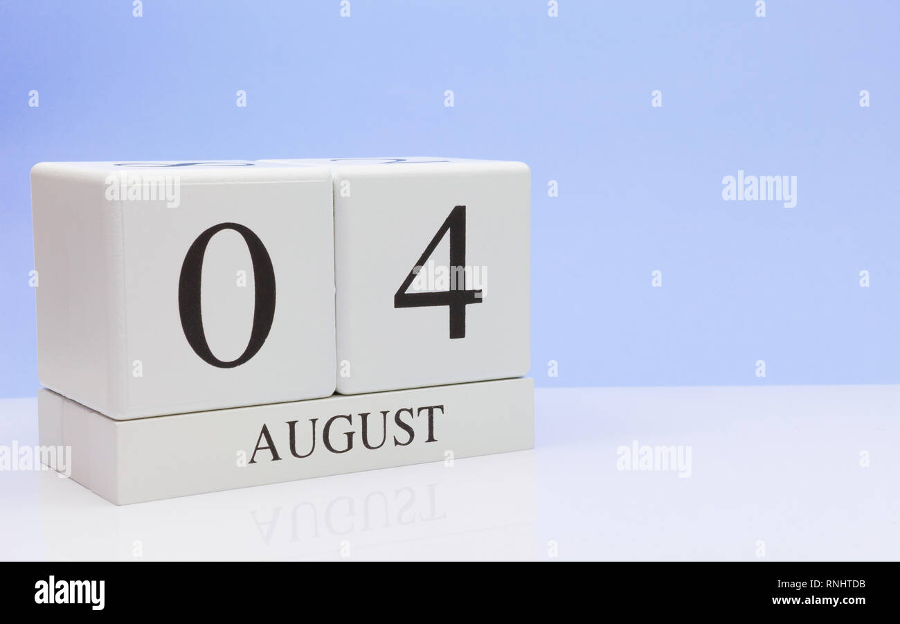 August 04st. Day 4 of month, daily calendar on white table with ...