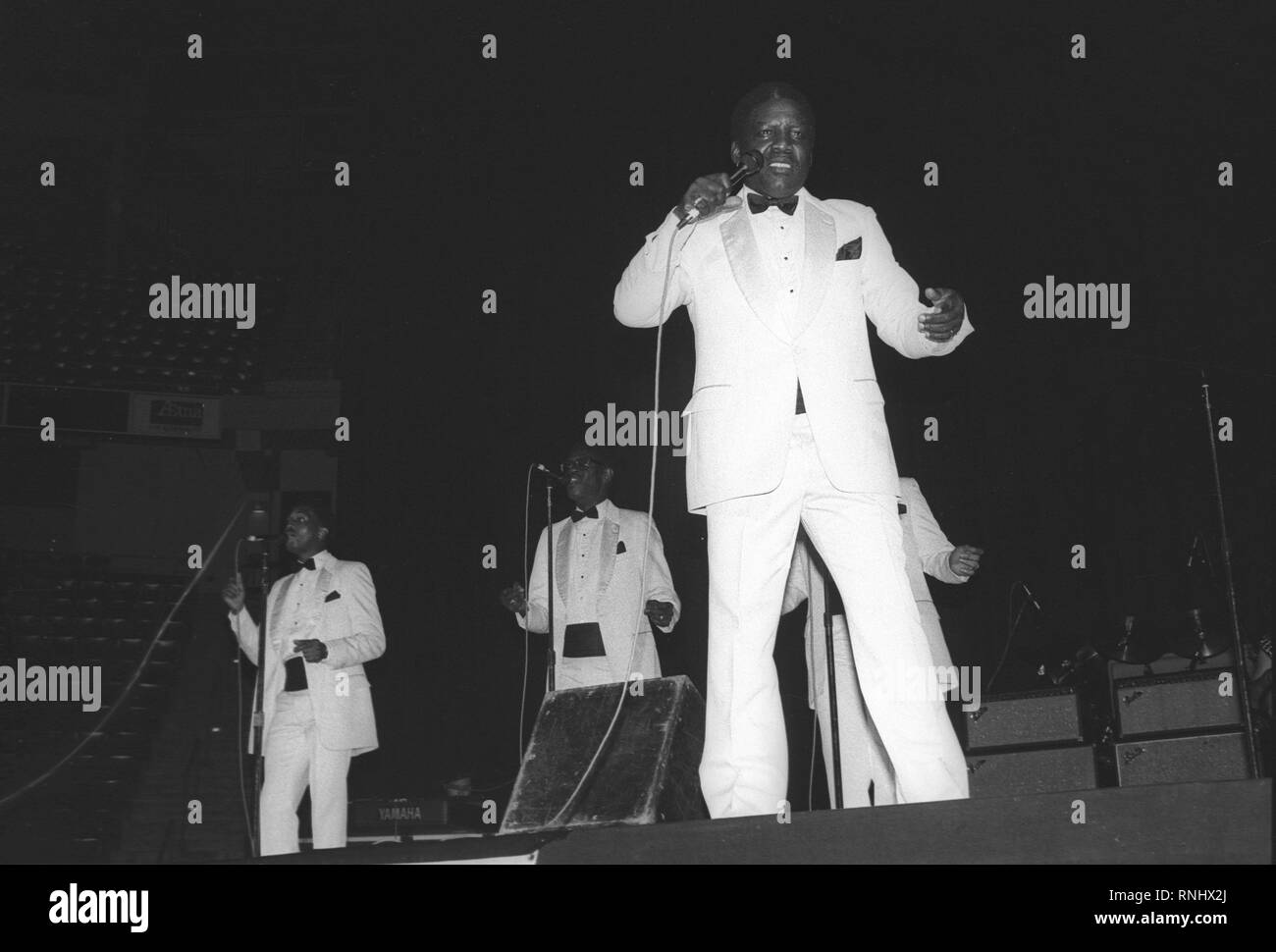 The Drifters are shown poerforming on stage during a "live" concert ...