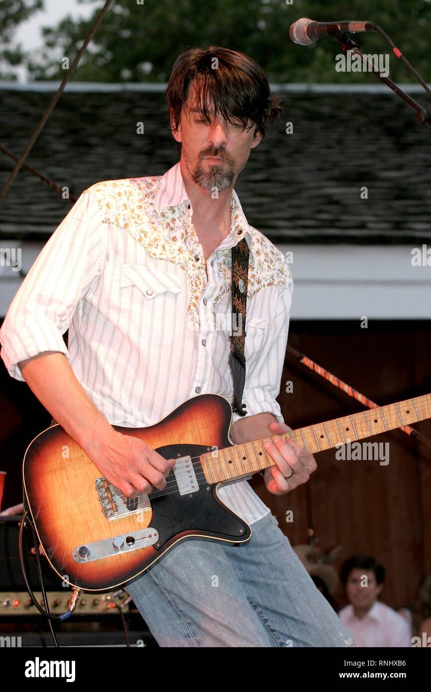 Drive By Truckers guitarist Mike Cooley is shown performing on stage ...