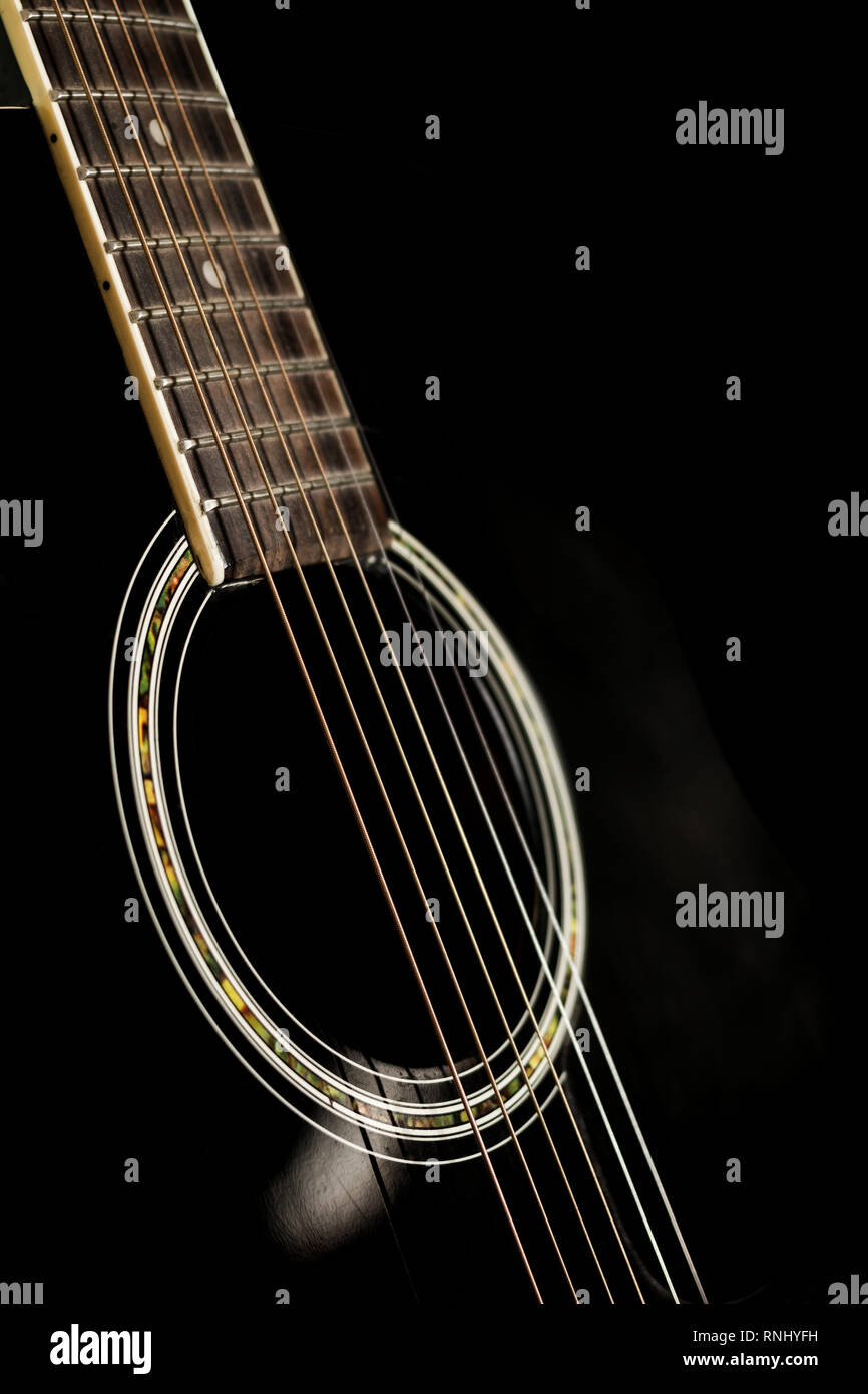 Six string guitar against a dark backgro Stock Photo - Alamy