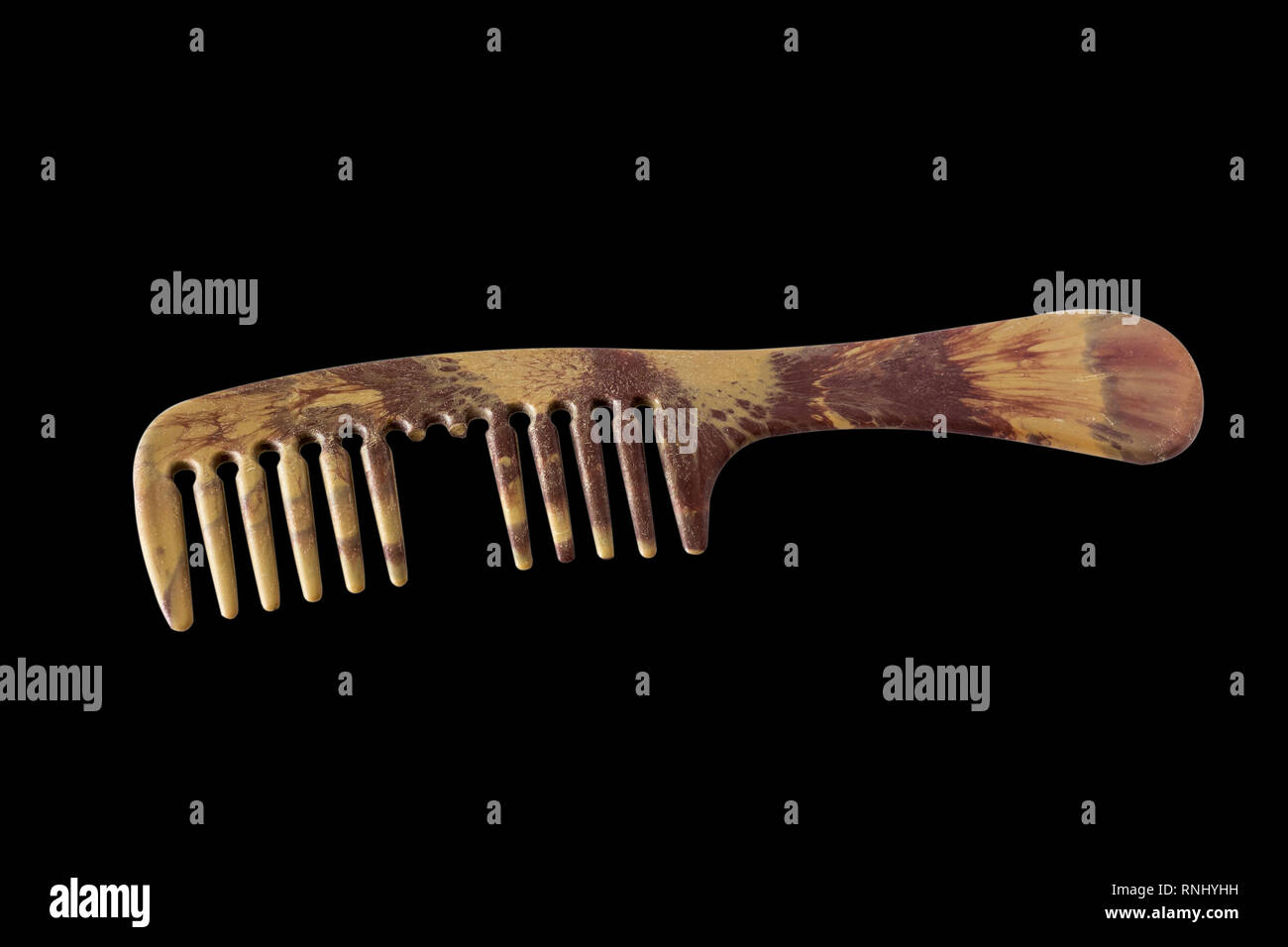 Comb old damaged isolate on black background Stock Photo - Alamy