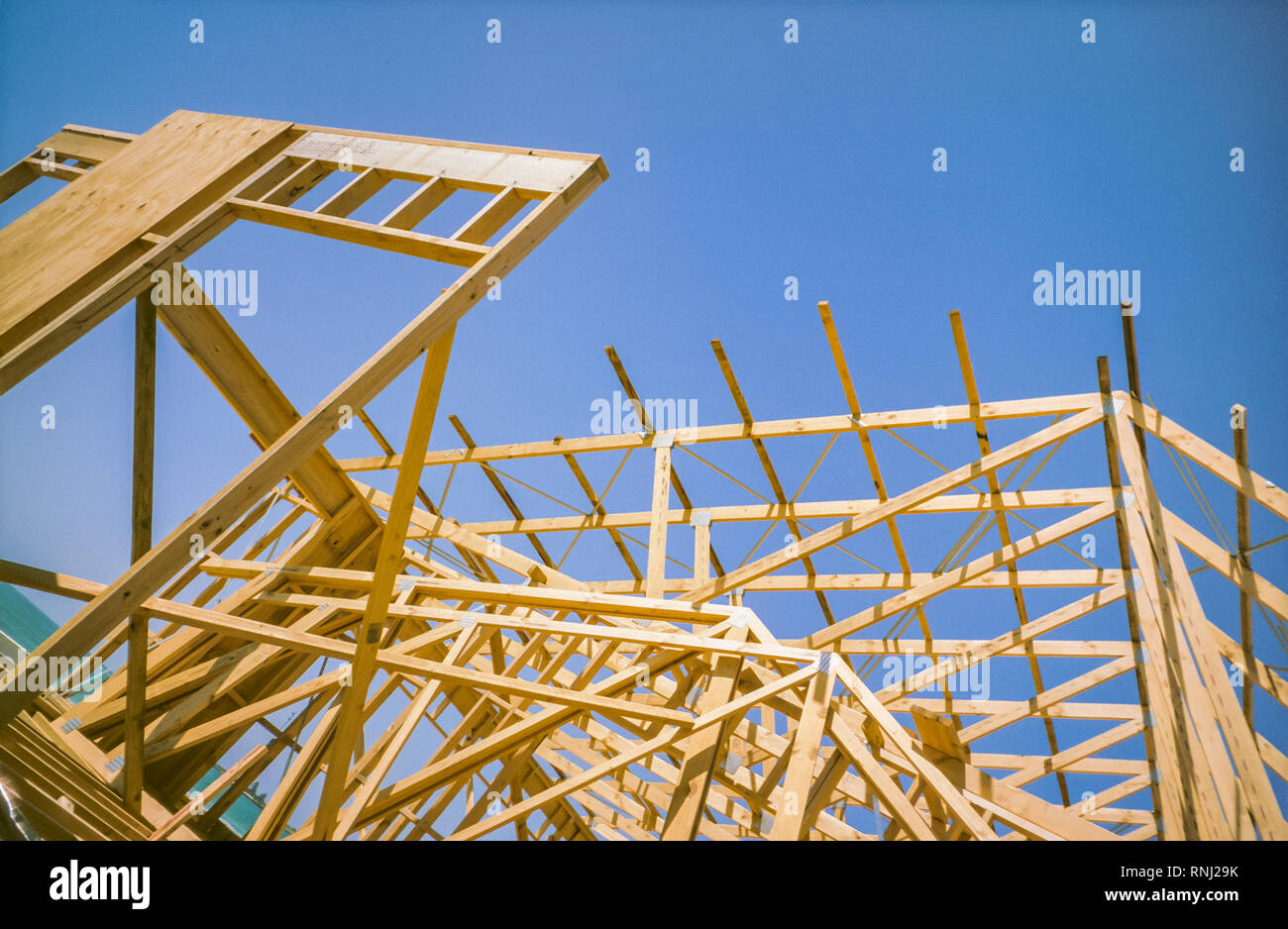 Incomplete building construction, roof detail Stock Photo - Alamy