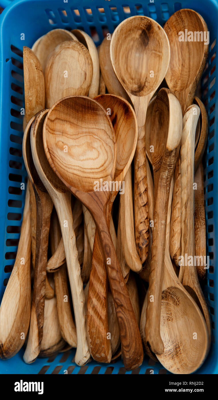 wooden spoons for sale on market, village fair Stock Photo - Alamy