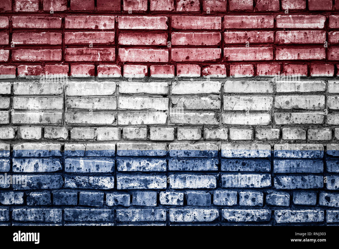 National flag of Netherlands on a brick background. Concept image for ...