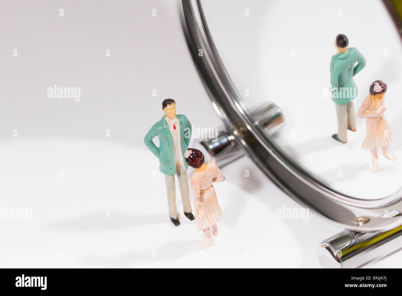 The mirror is different from the reality, a pair of young people Stock ...