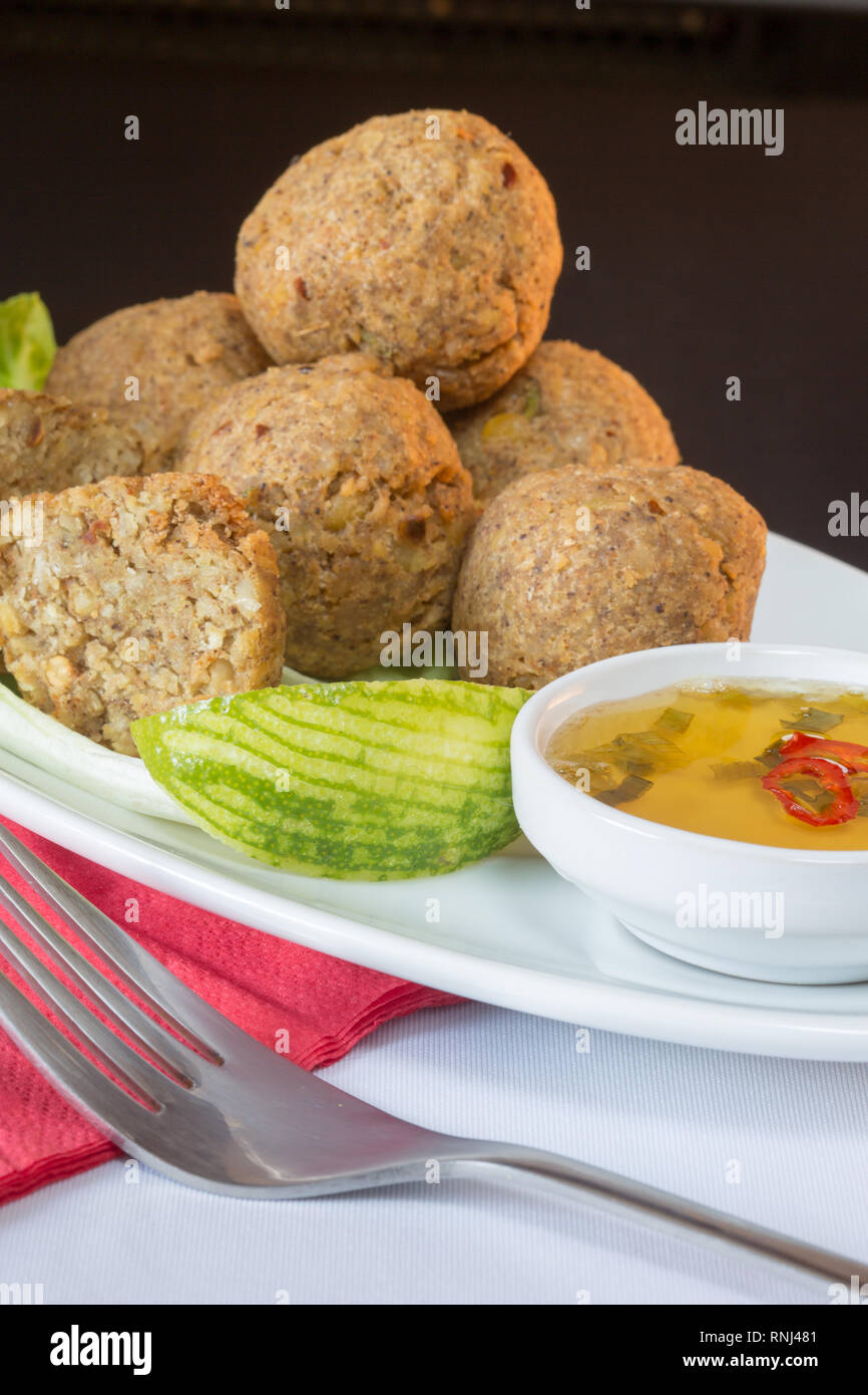 Thai dish of deep fried yellow beans with thick sweet sauce, baa yir ...