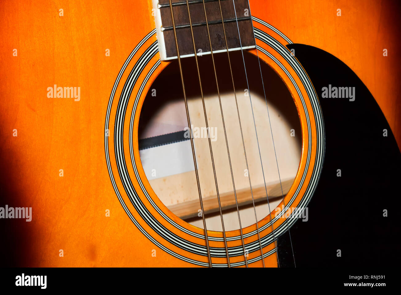 Close up part of acoustic six string guitar Stock Photo - Alamy