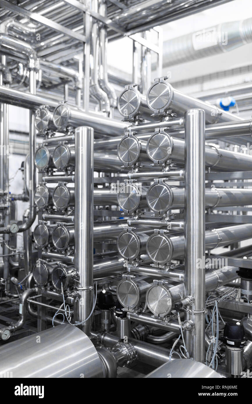 Steel water pipeline, chrome pipes, pipe lines in plant workshop ...