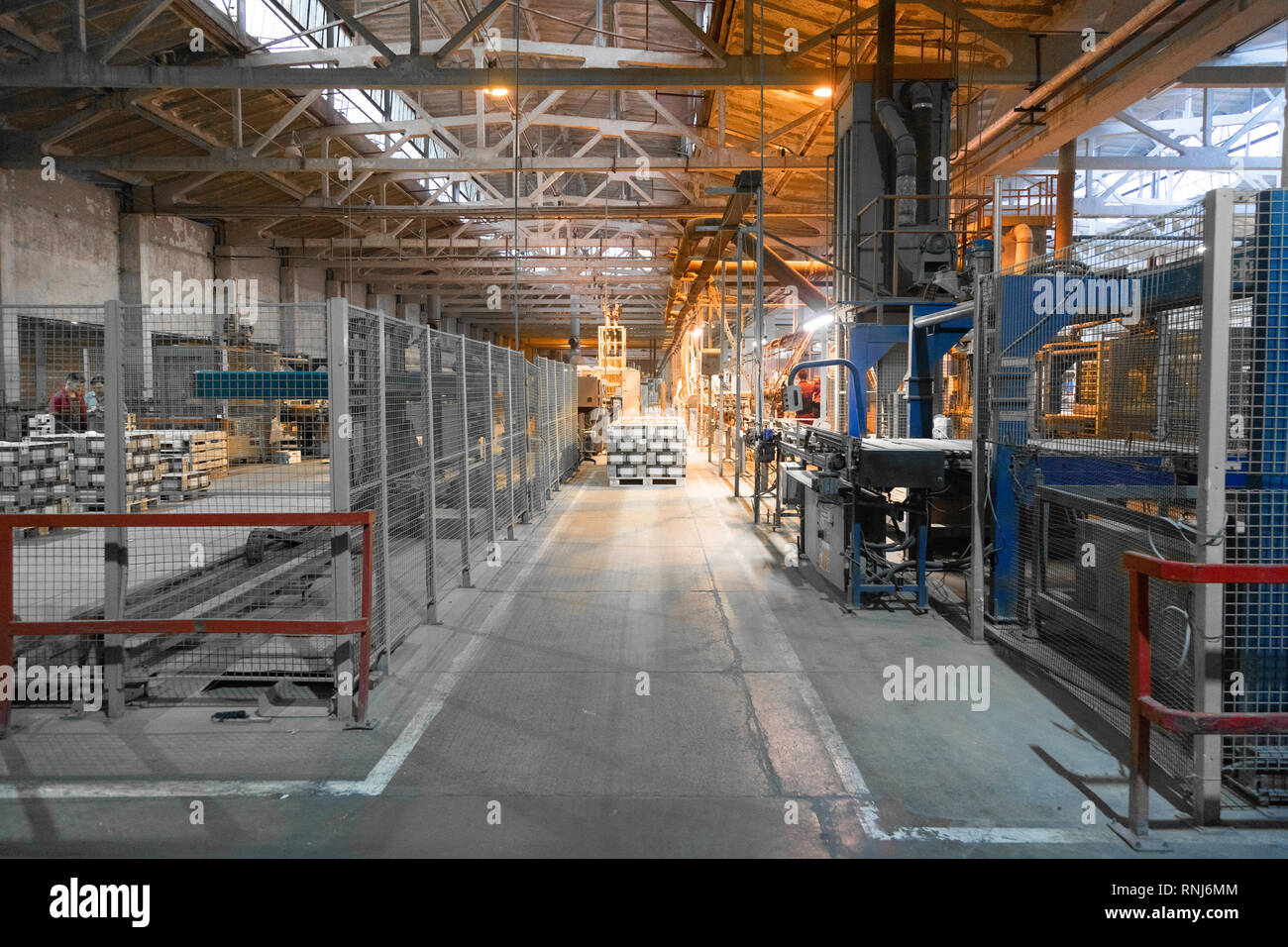 Long dusty corridors inside the ceramic factory Stock Photo - Alamy