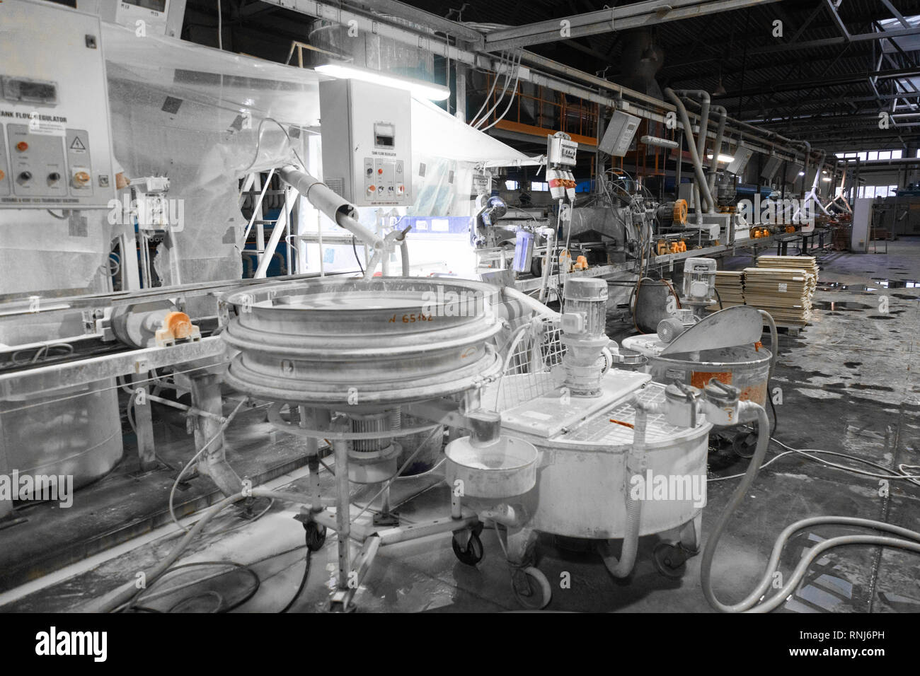 Manufacture of cement inside the building of the plant Stock Photo - Alamy