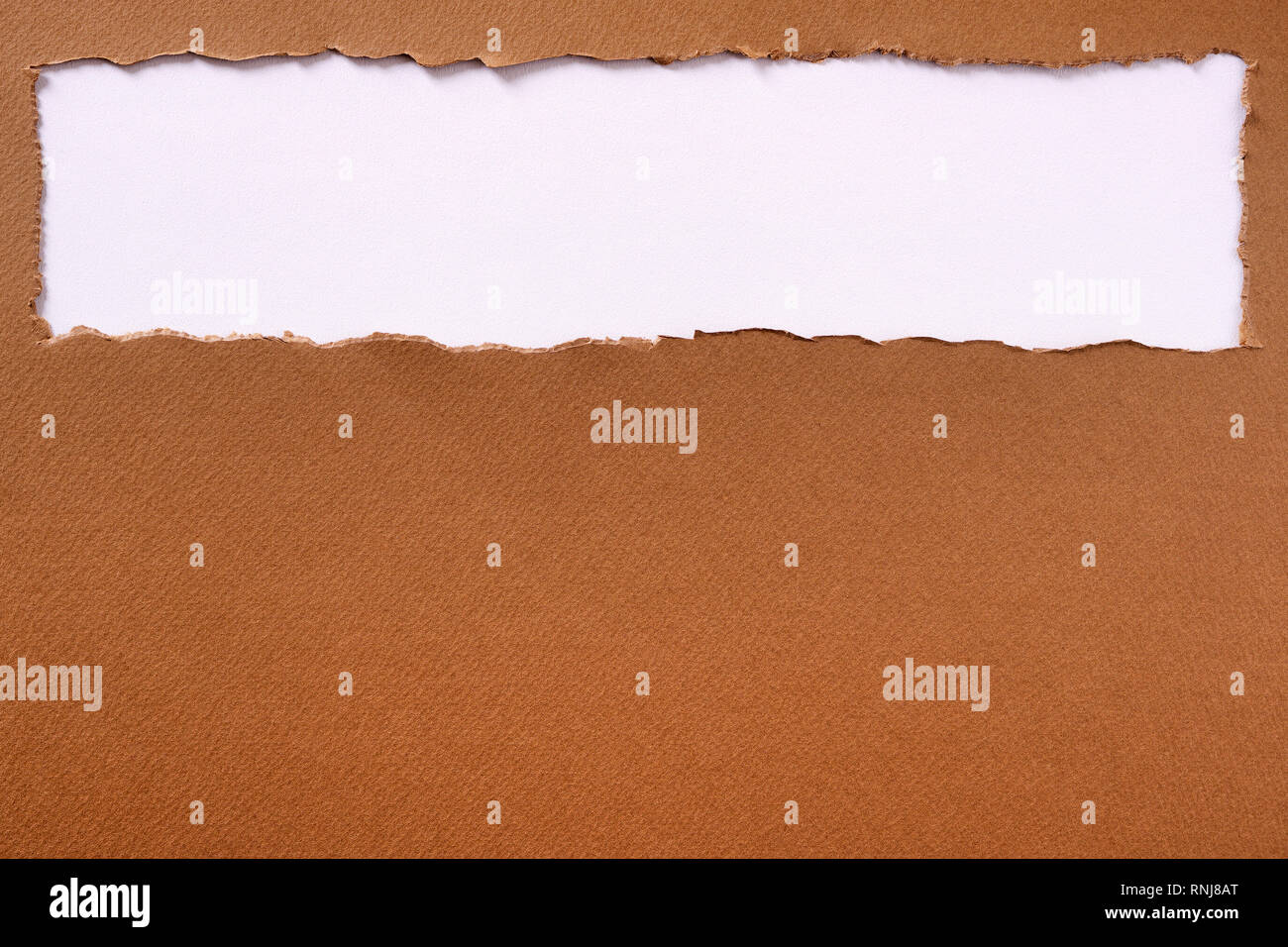 Torn brown paper strip top edge header background frame Stock Photo - Alamy