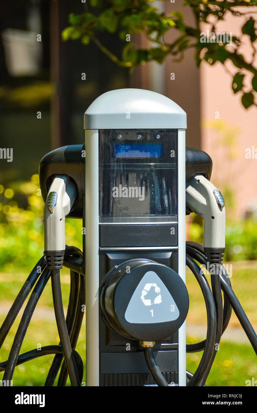 Electric car charging point installed on bright sunny day Stock Photo ...