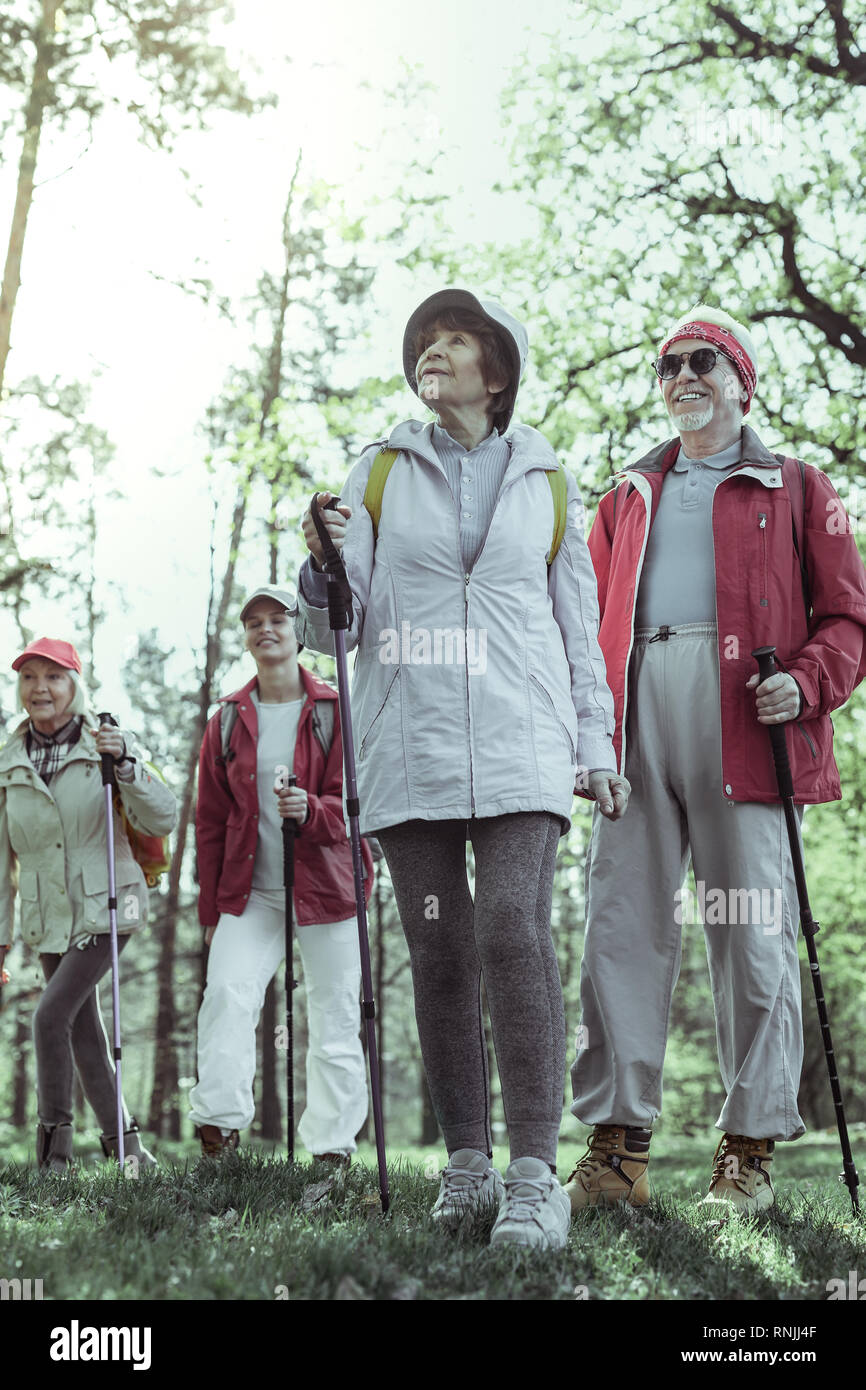 Active elderly people exploring natural attractions on theweekend Stock ...