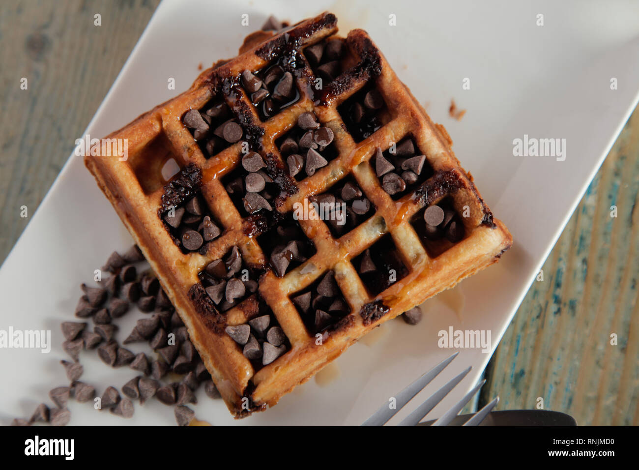 Closeup Chocolate Chip Waffle with whipped cream Stock Photo - Alamy