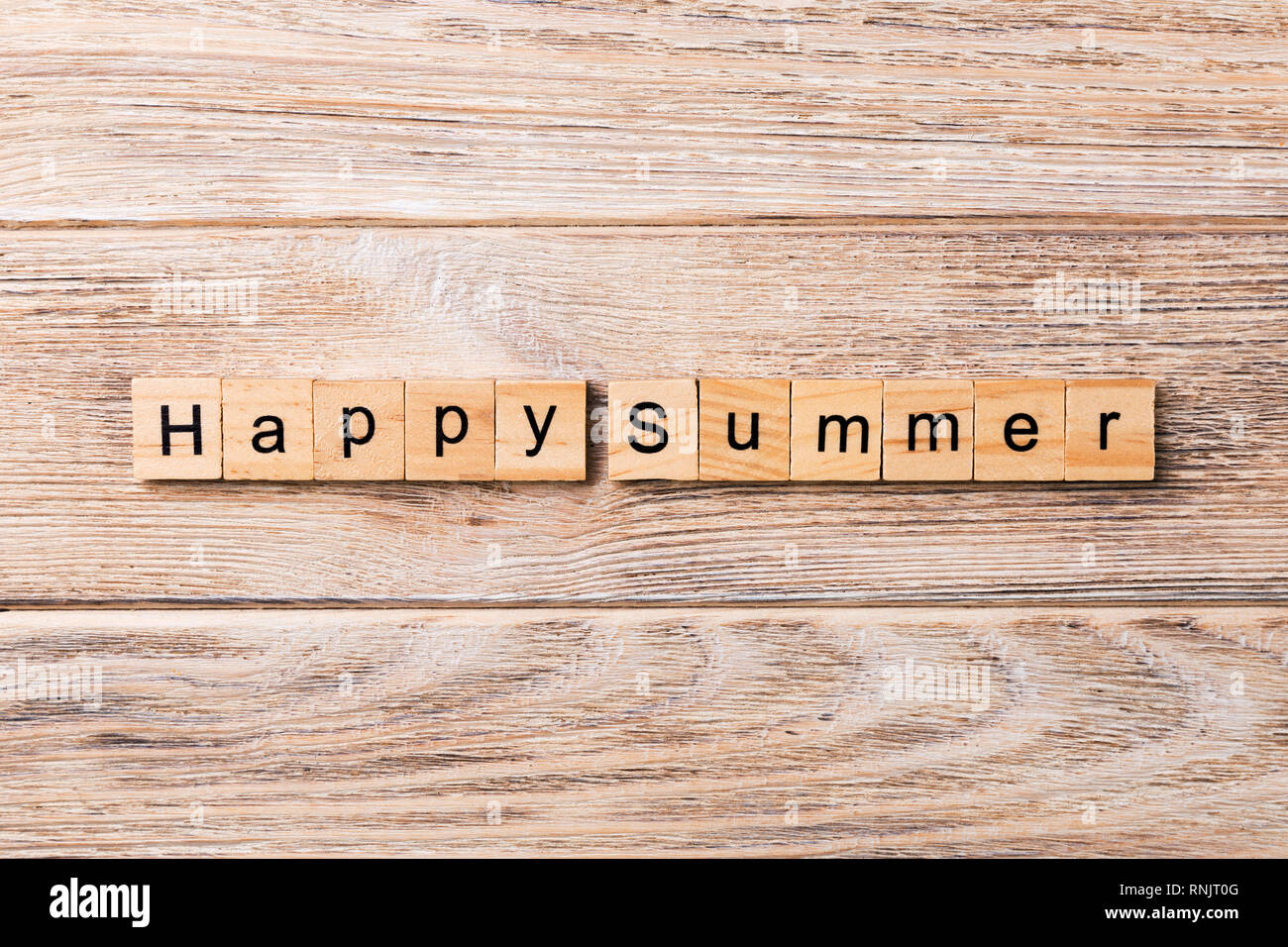 Happy Summer word written on wood block. Happy Summer text on wooden ...