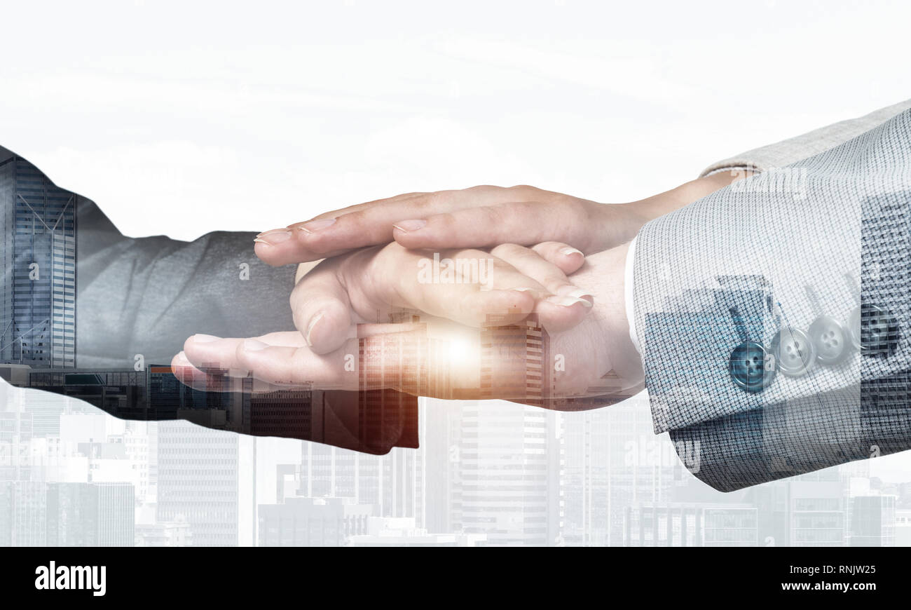 Concept of teamwork and unity with palms one on one in pile Stock Photo ...