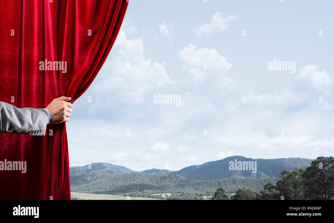 Human hand behind curtain hi-res stock photography and images - Alamy