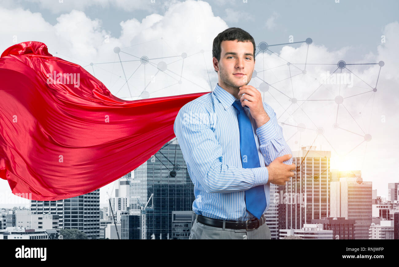 Concept of power and sucess with businessman superhero in big city ...