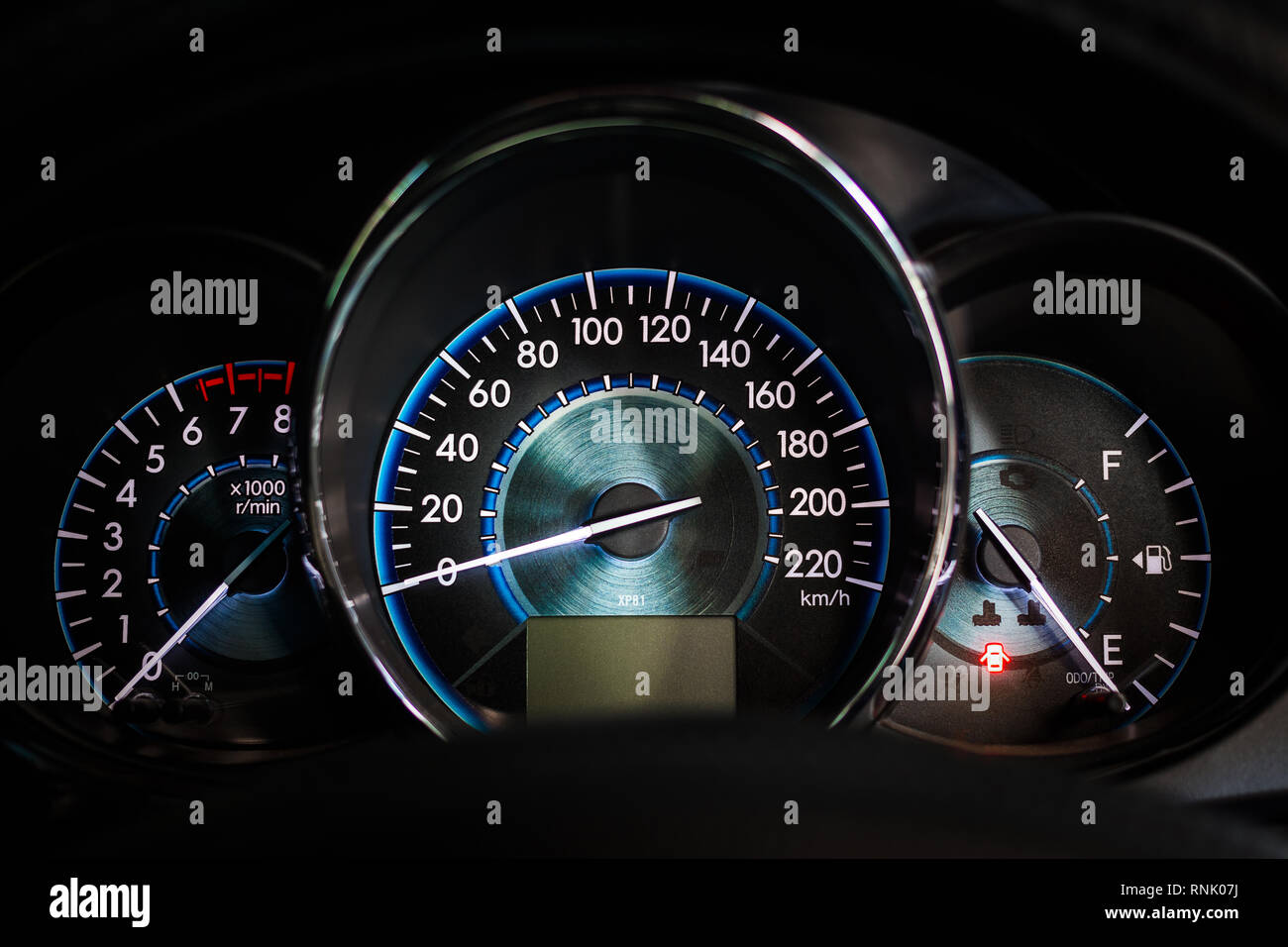 Illuminated car dashboard Stock Photo - Alamy