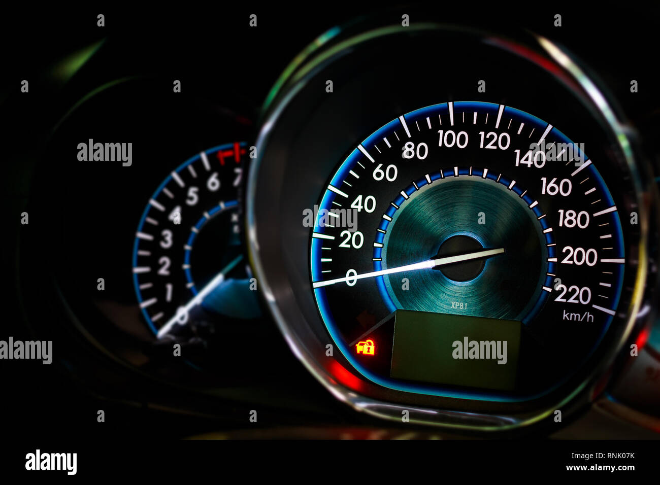 Illuminated car dashboard Stock Photo - Alamy