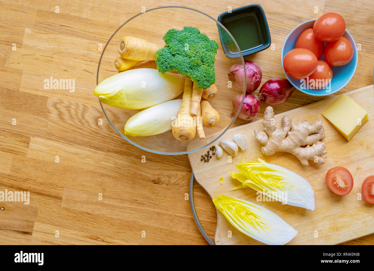 Vegetables on a table board, top view Stock Photo - Alamy