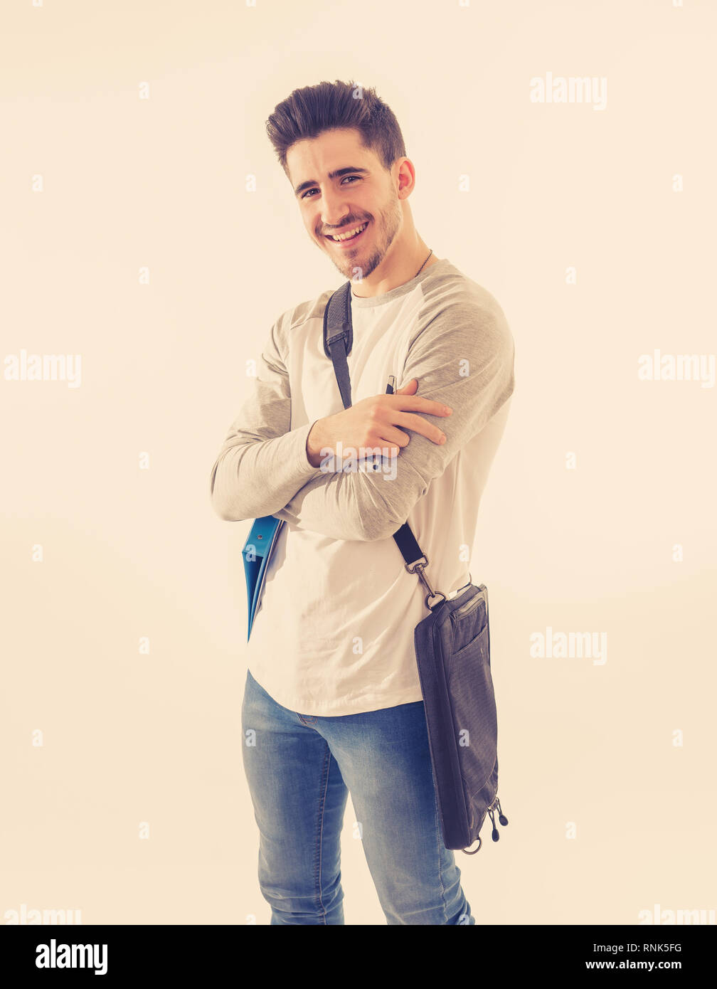 Portrait of Handsome college student man with backpack and notepad ...