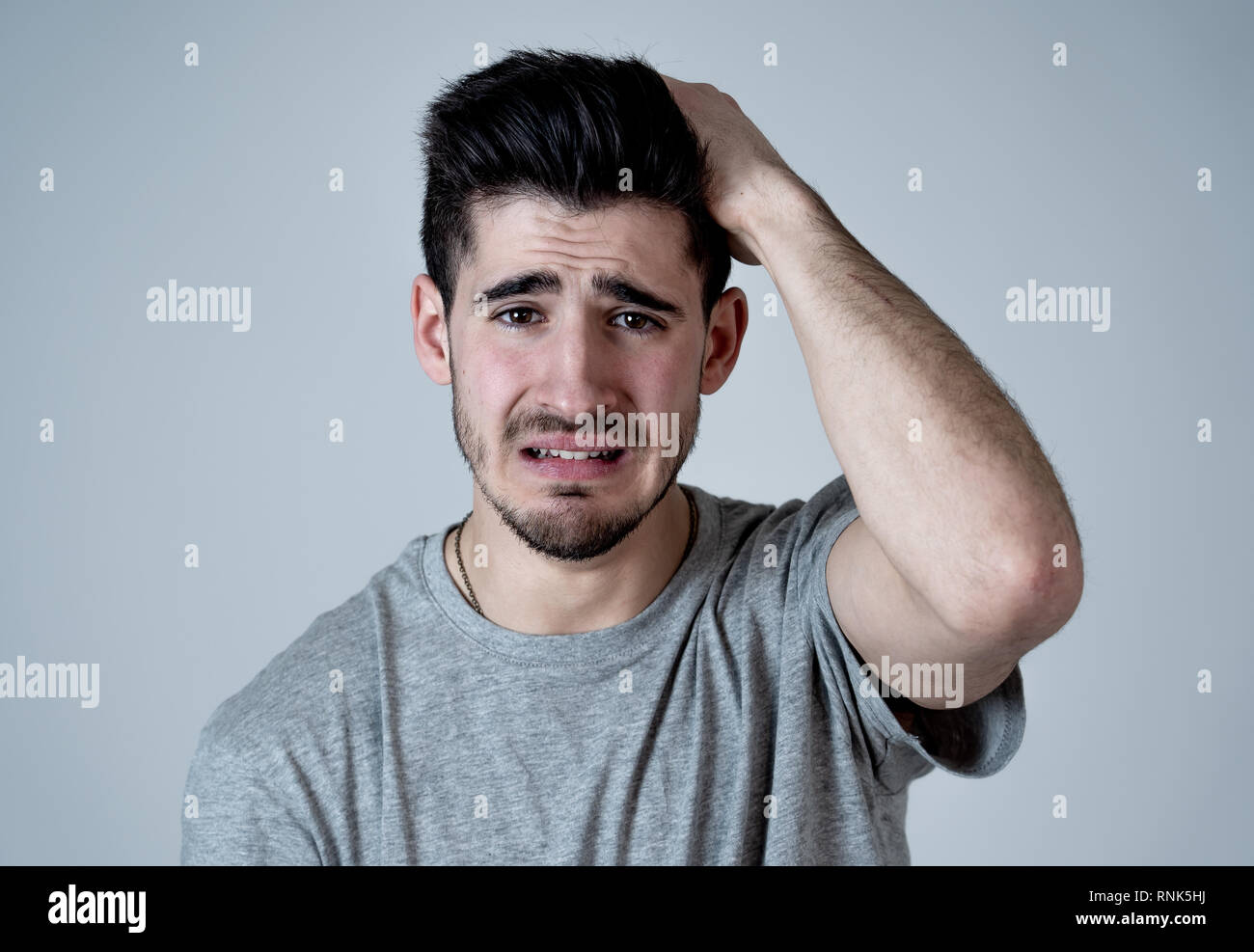 Close up portrait of handsome young man crying suffering from ...