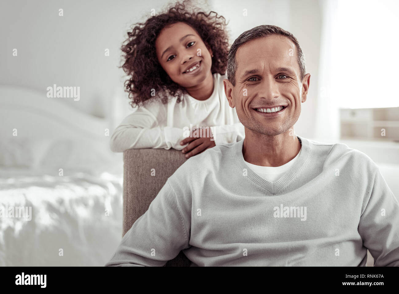 Father looking positive kid hi-res stock photography and images - Alamy