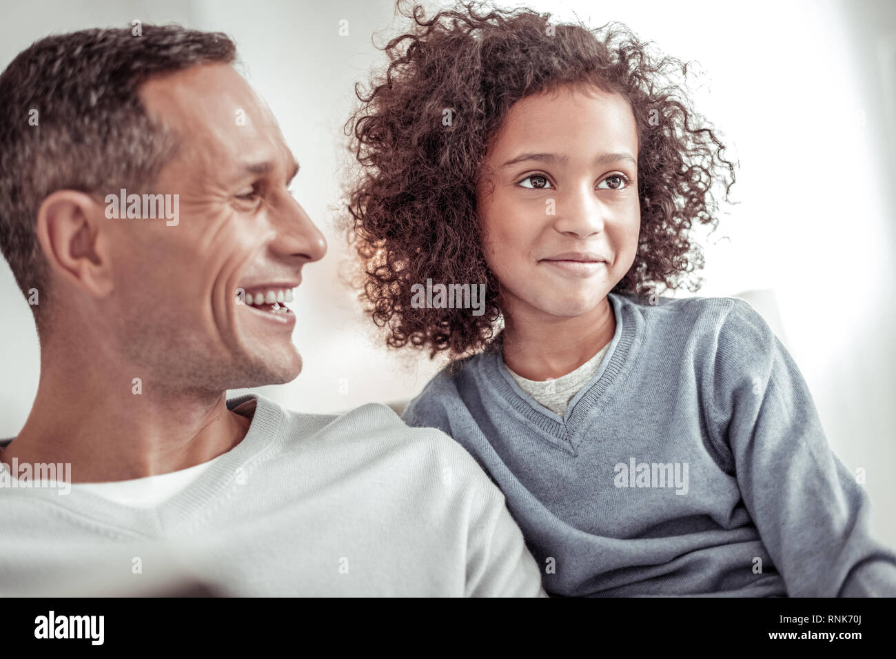 Attractive handsome father looking at his daughter Stock Photo - Alamy