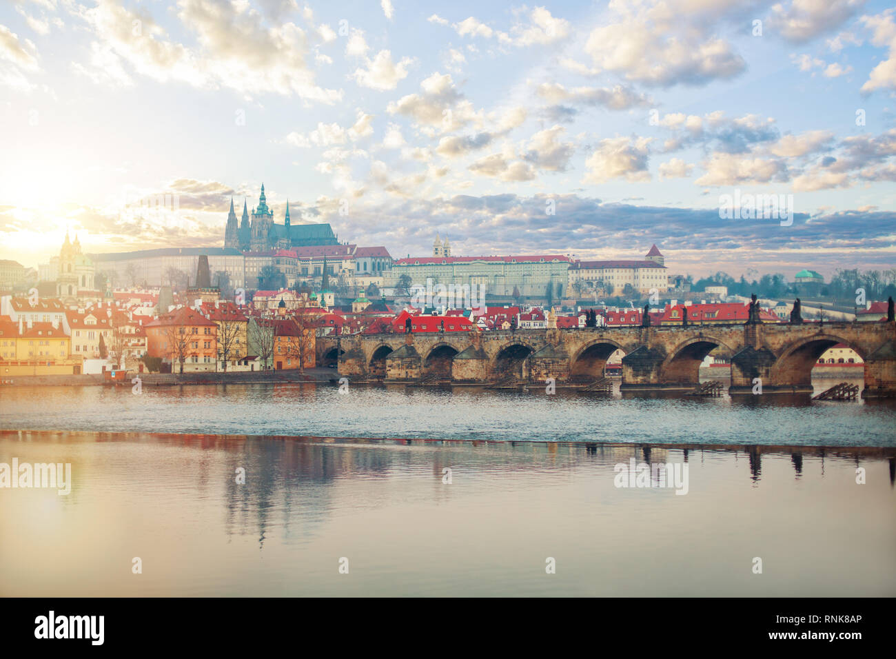 Charles bridge, old tower, castle and Vltava river on the side of Mala ...