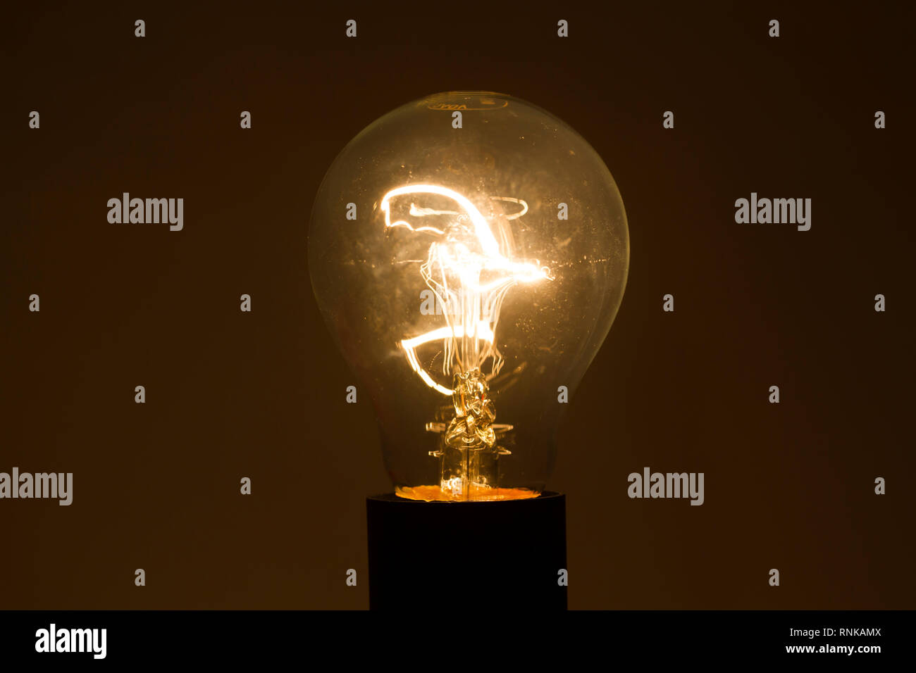 Glowing light bulb Stock Photo - Alamy