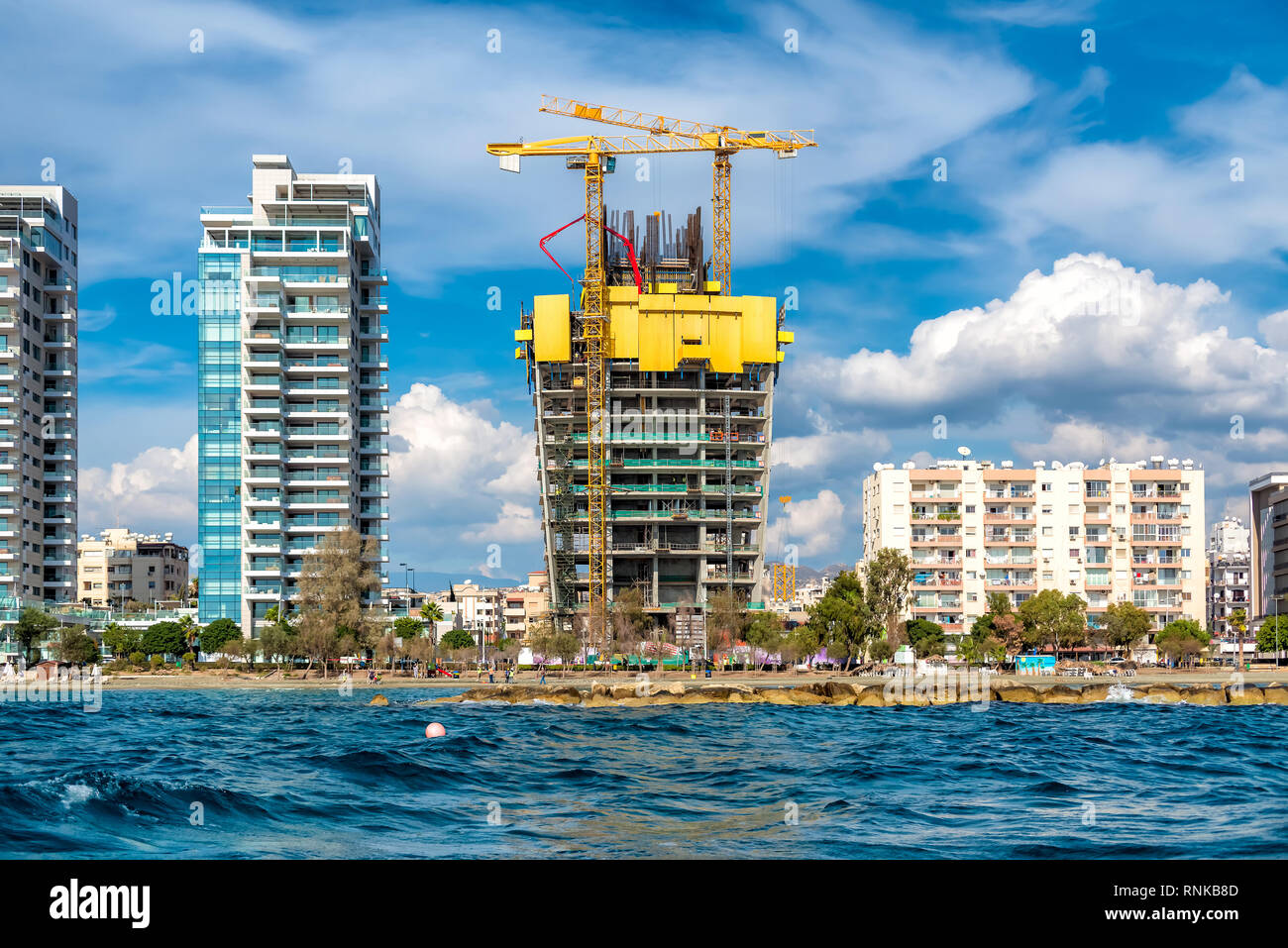 Crane and construction site along Limassol seafront. Cyprus Stock Photo ...