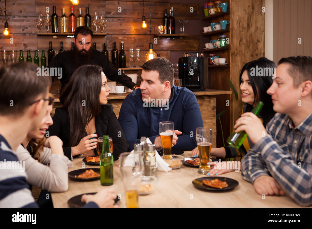Friends family drinking bar in hi-res stock photography and images - Alamy