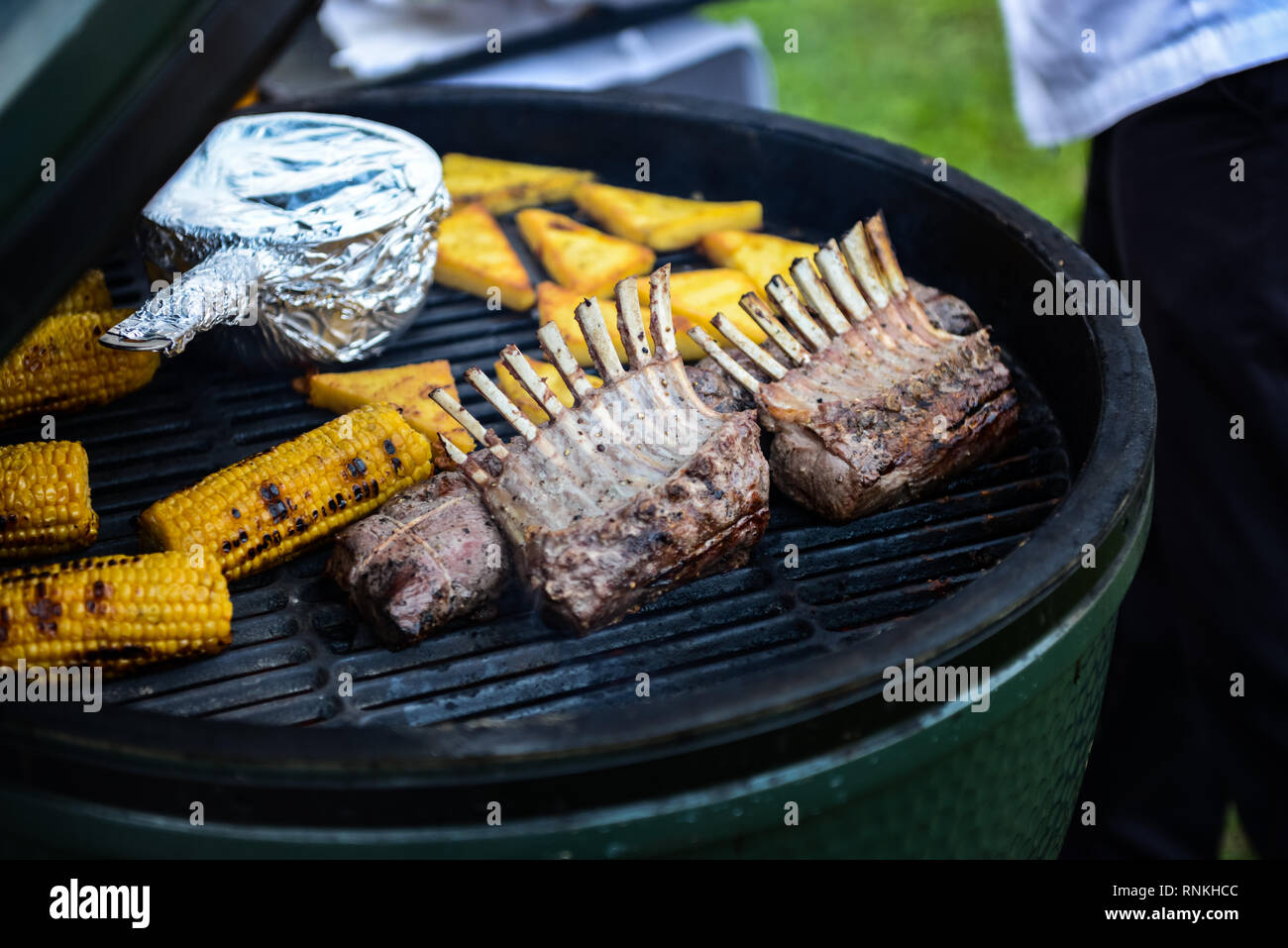 Barbecue ribs and corn on the grill Stock Photo - Alamy