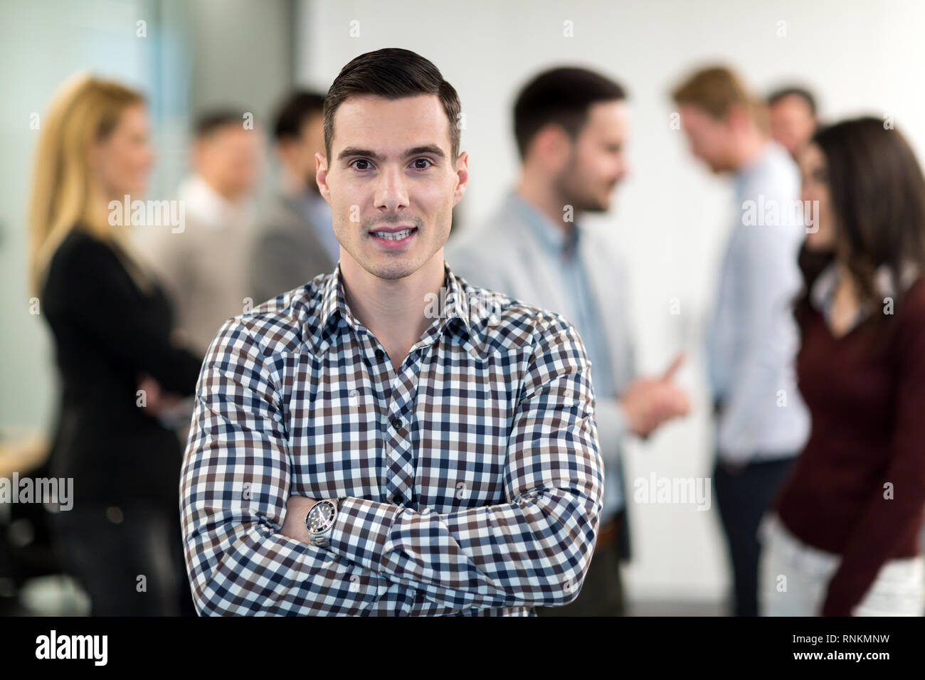 Group of young business people posing as confident team hi-res stock ...