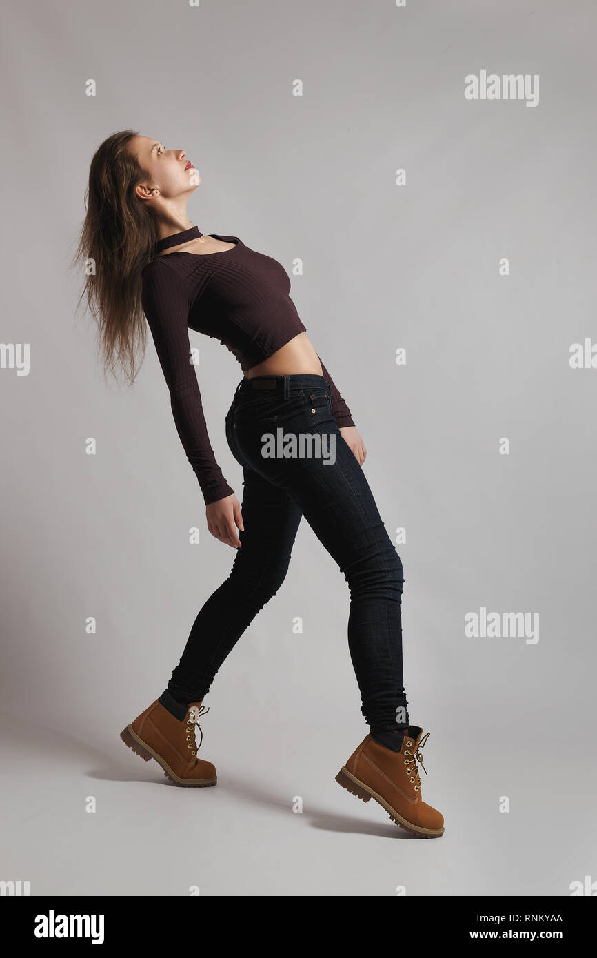 Side view of a woman dancing ballet. The girl is balancing. Side view ...