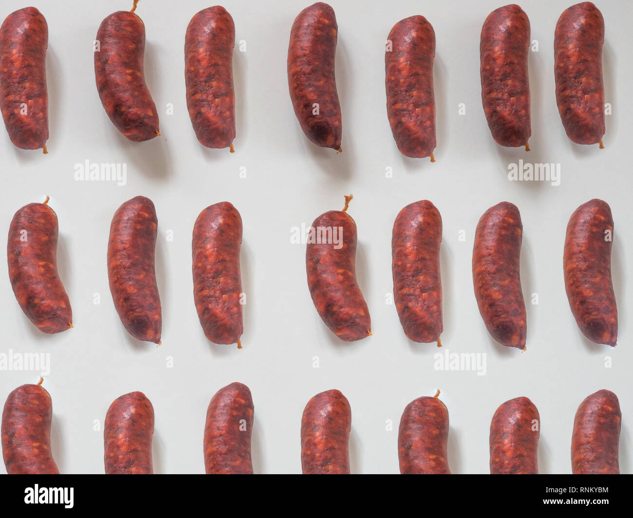 Spanish sausage pattern on white background Stock Photo - Alamy