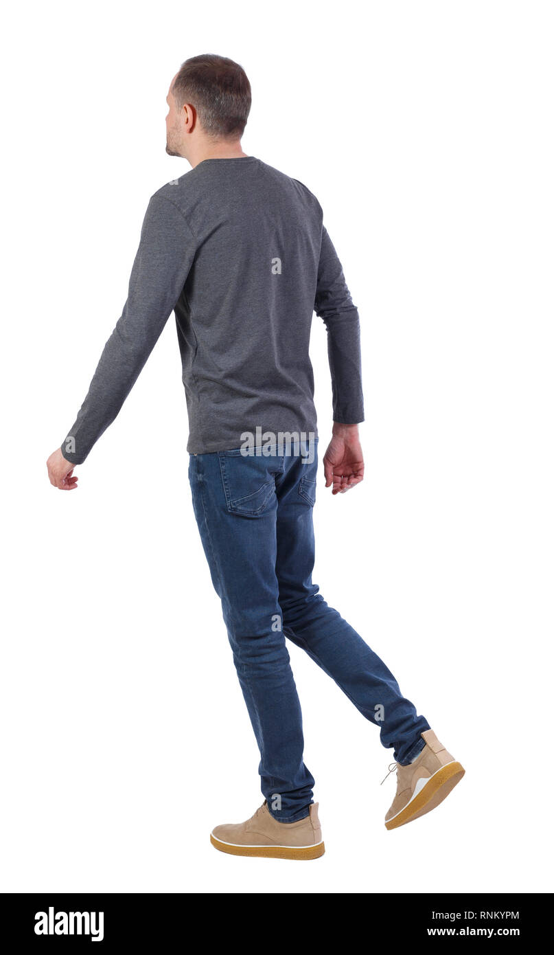 Side view of going handsome man. walking young guy . Rear view people ...