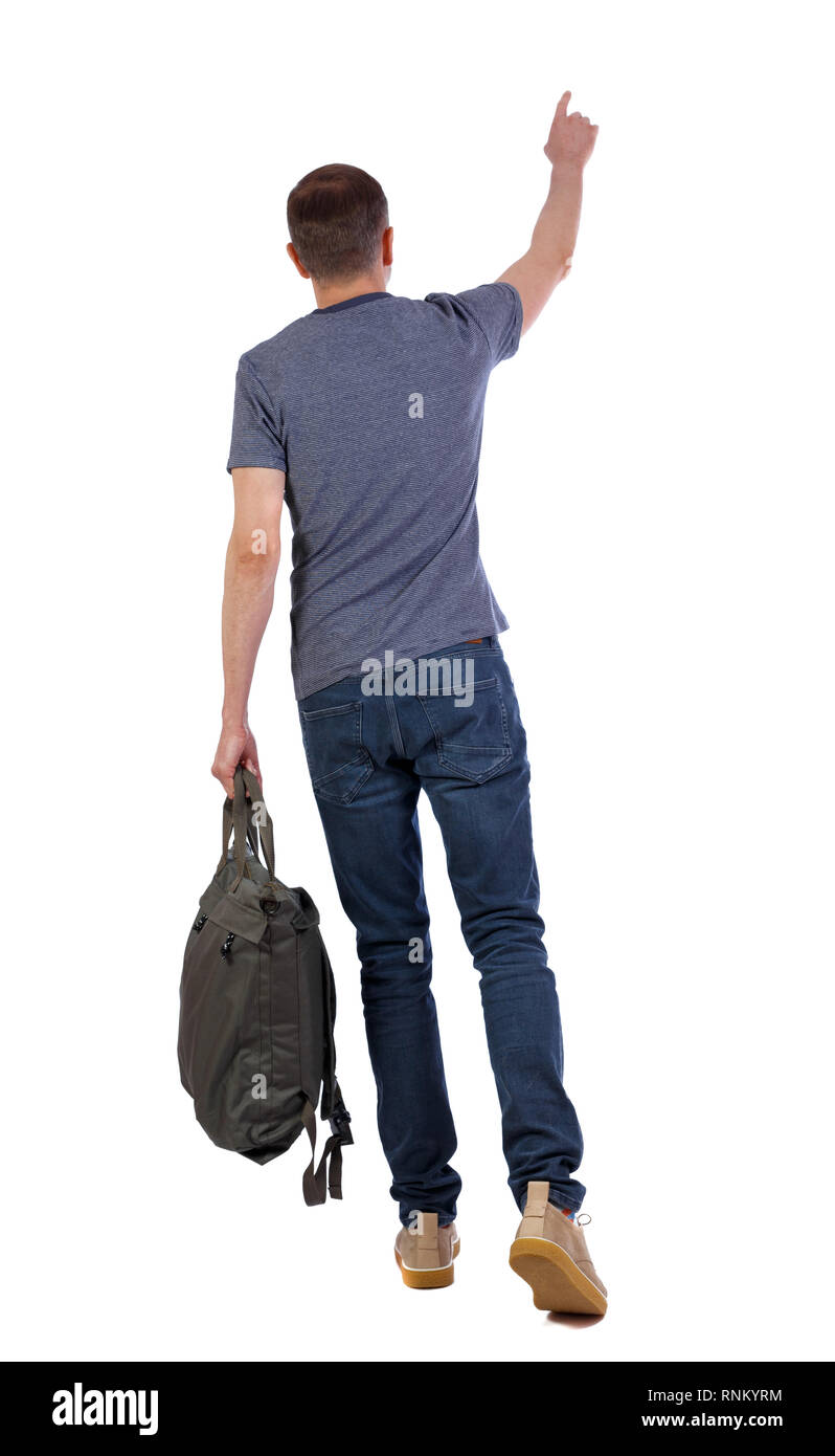 Back view of a walking man with a bag pointing his hand up. backside ...