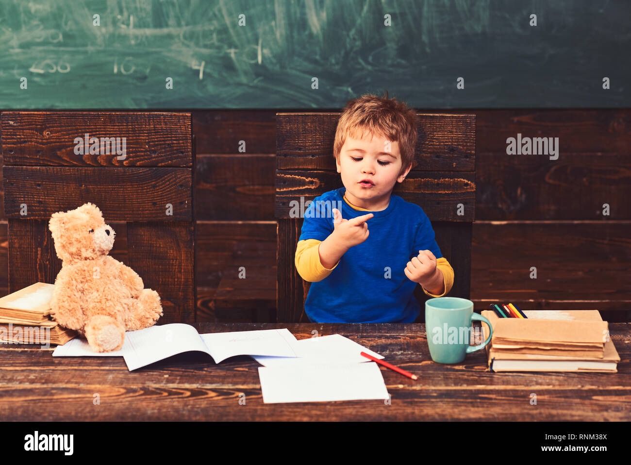 Small kid learning to count. Adding numbers with hands. Math lesson at ...
