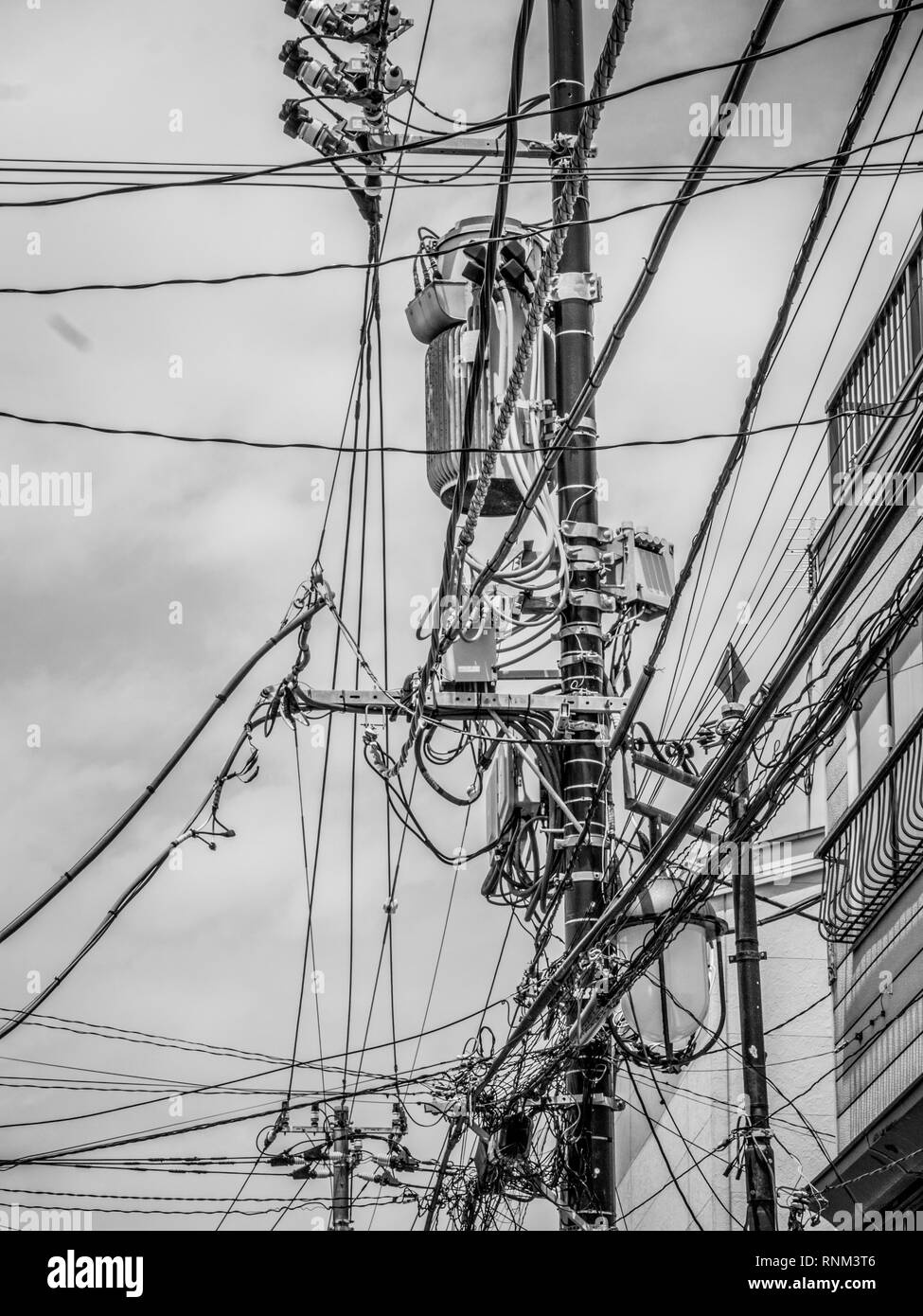 Outdoor electricity wires in the streets of Japan Stock Photo - Alamy