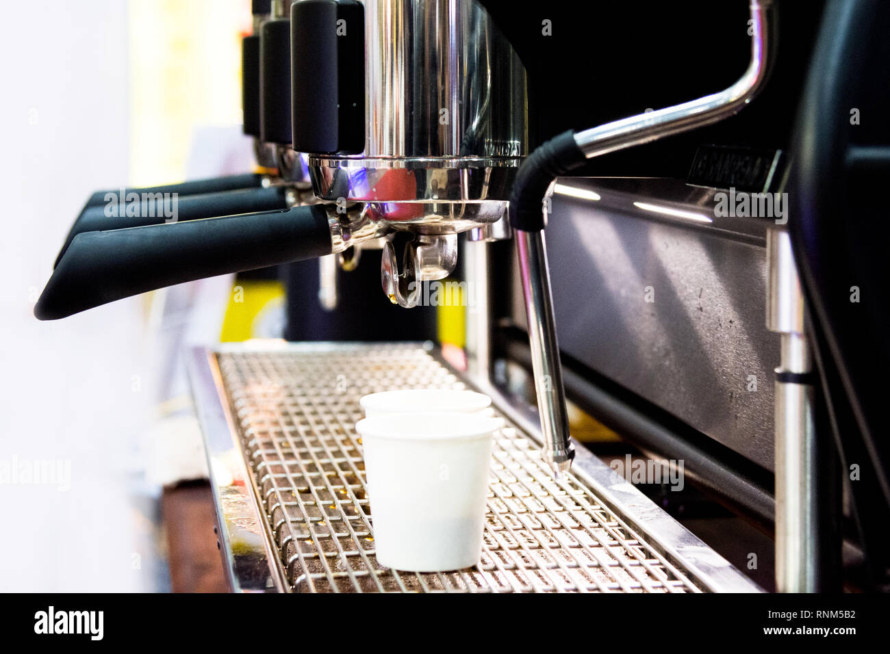 espresso shot from coffee machine in coffee shop,Coffee maker in coffee ...