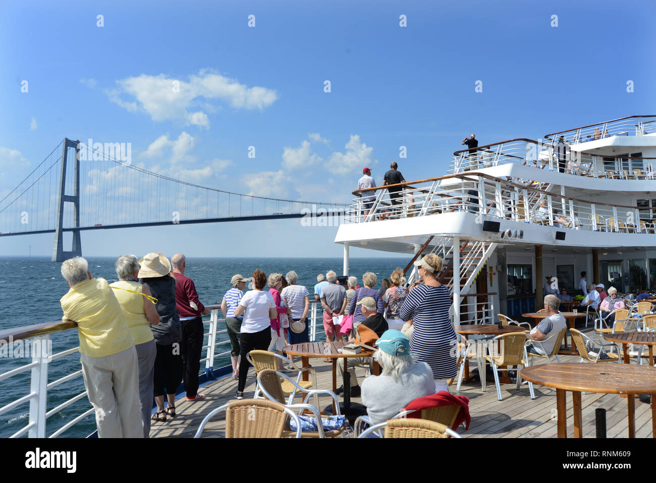 A cruise ship approaches the huge bridge between Sweden and Denmark on ...