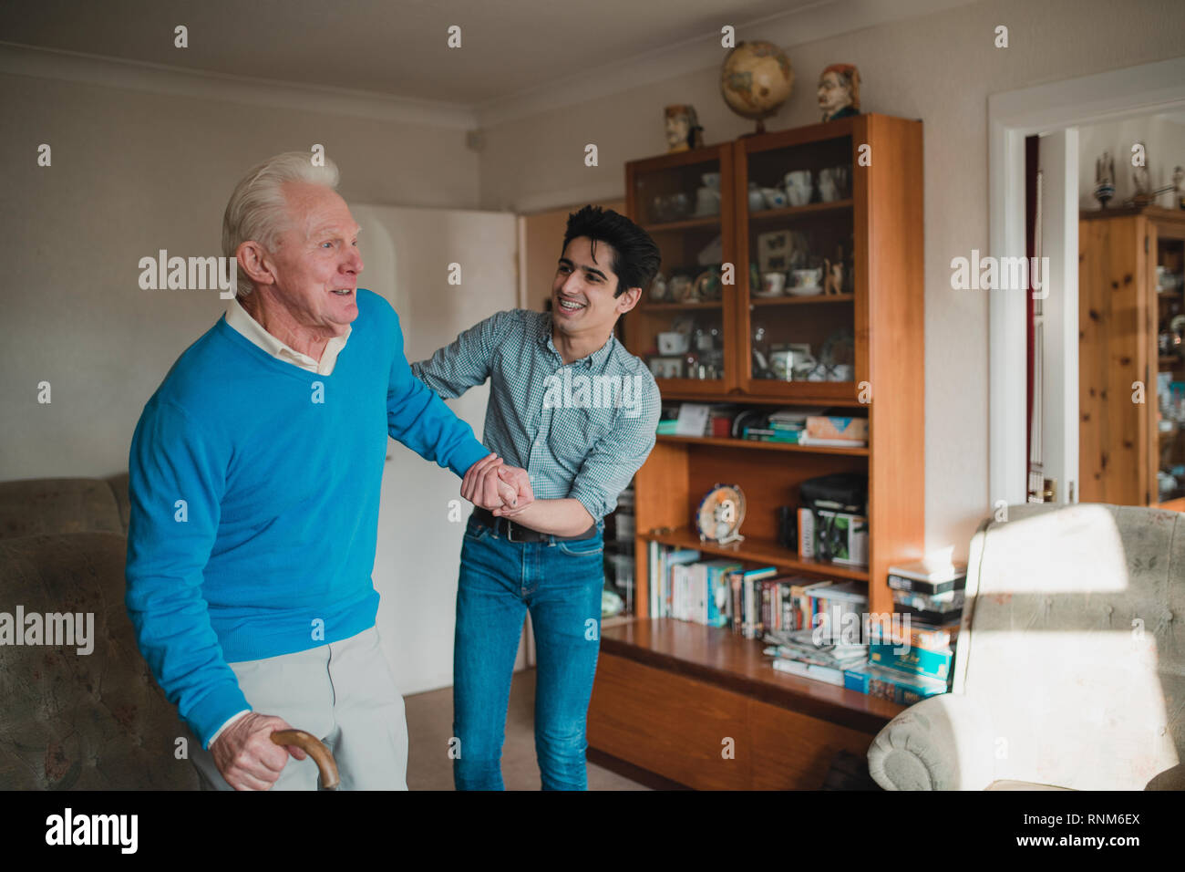 Helping out family hi-res stock photography and images - Alamy