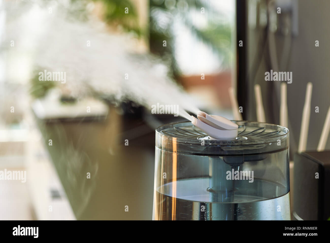 Ultrasonic cool mist humidifier for home on a table Stock Photo - Alamy
