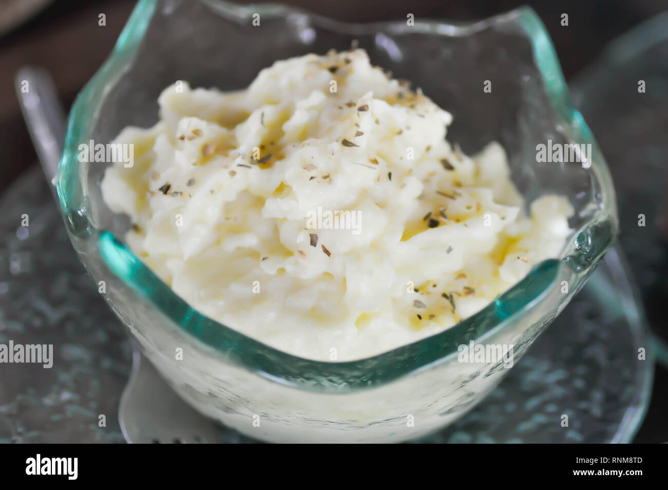 mash potato with oregano Stock Photo - Alamy